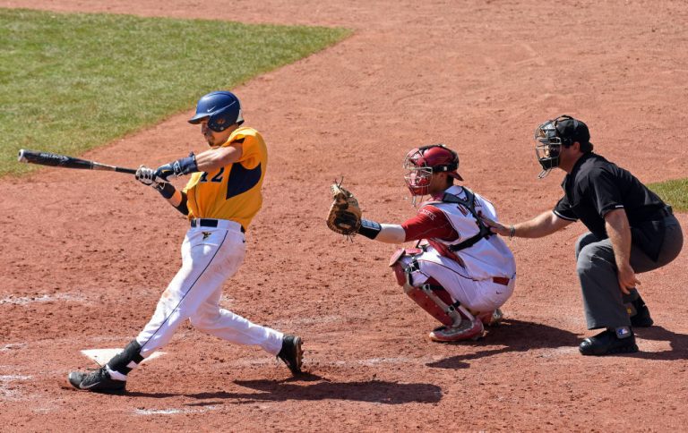 Dotson delivers, offense surges as West Virginia coasts into Big 12 ...