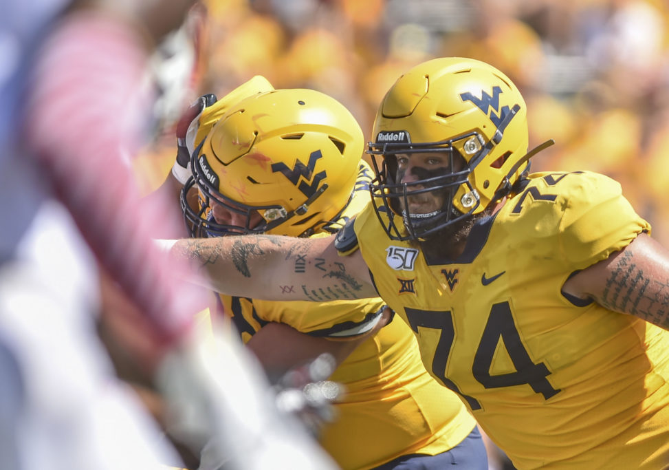 Matt Moore hoping to make up for lost time with the WVU offensive line ...