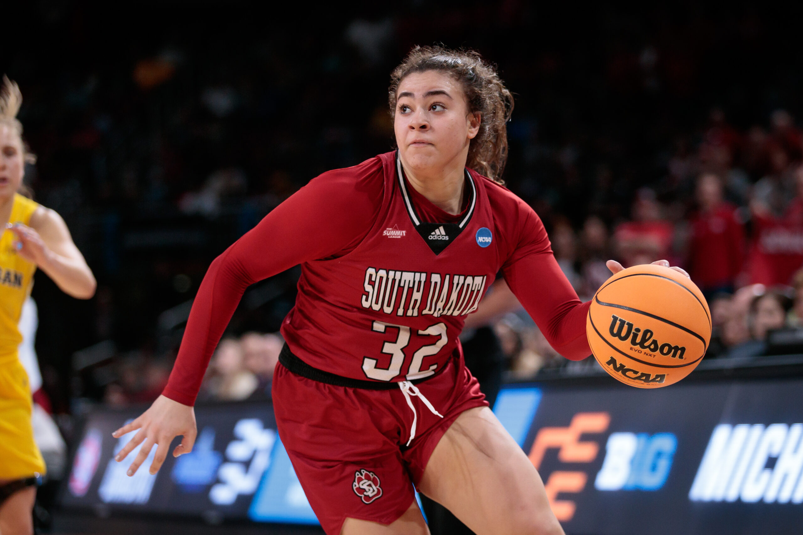 Guard Kyah Watson following Plituzweit from South Dakota to West Virginia - WV MetroNews