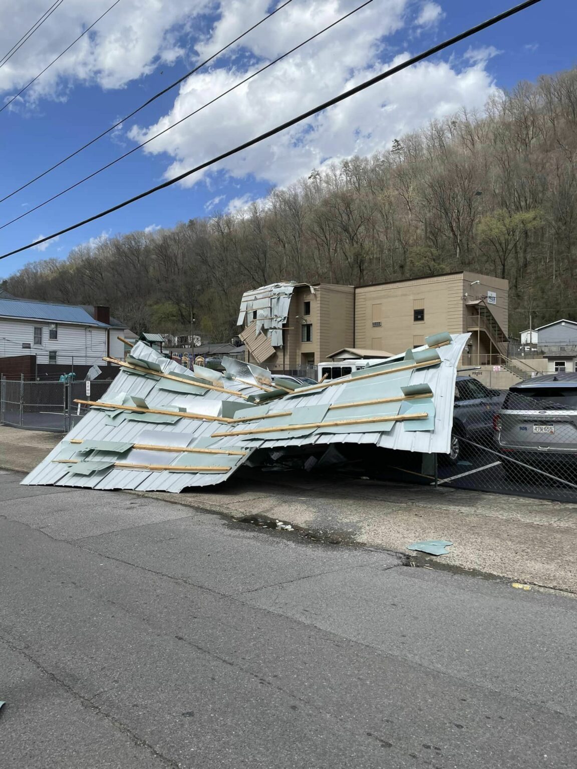 Weekend winds rip roof off Logan building - WV MetroNews