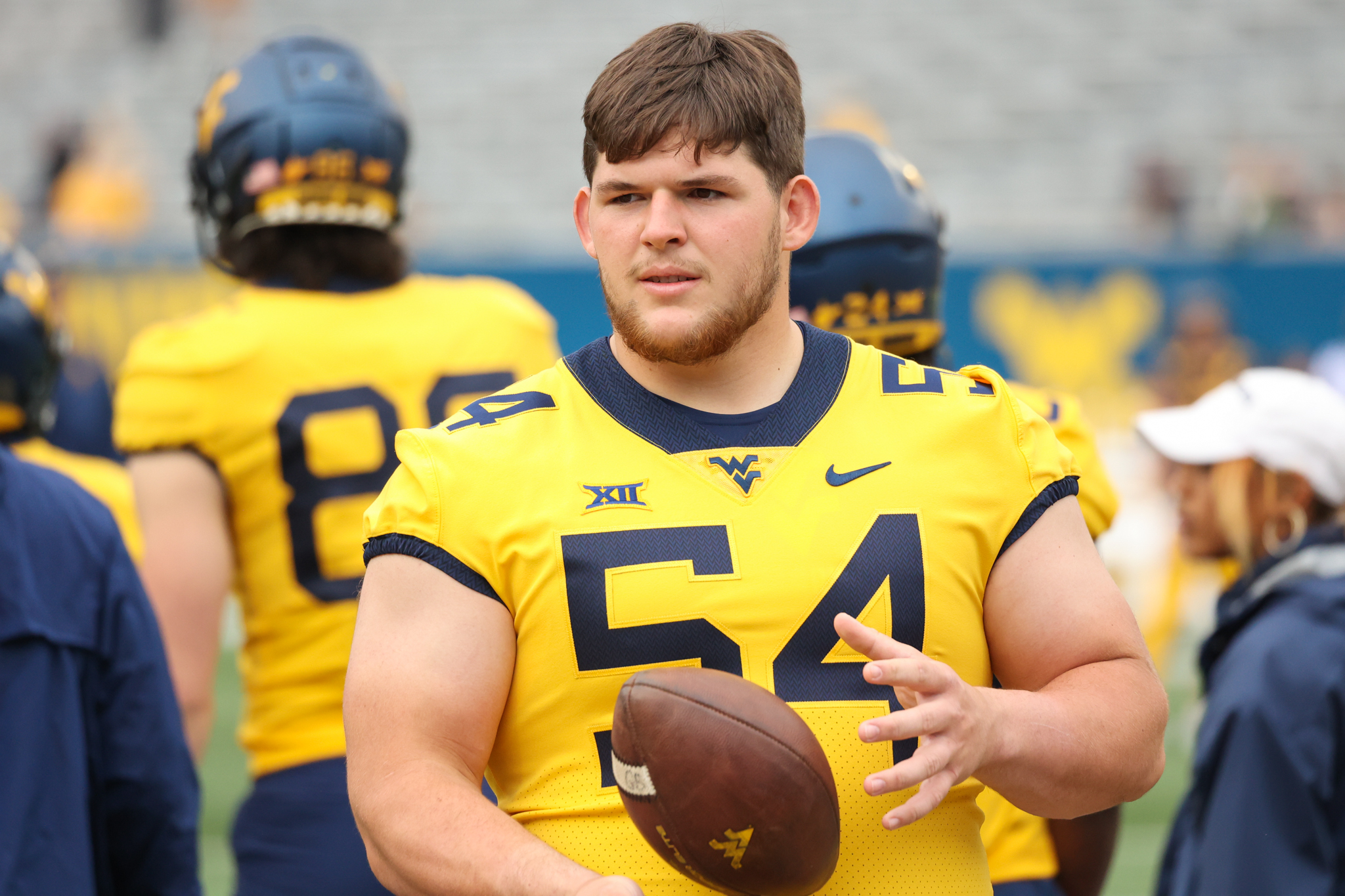 WVU's Chad Scott to utilize 'crafty' offense behind mobile QBs and ...