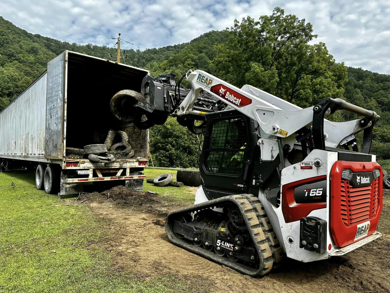 Volunteers continue to pull hundreds of tires from the Tug Fork River ...
