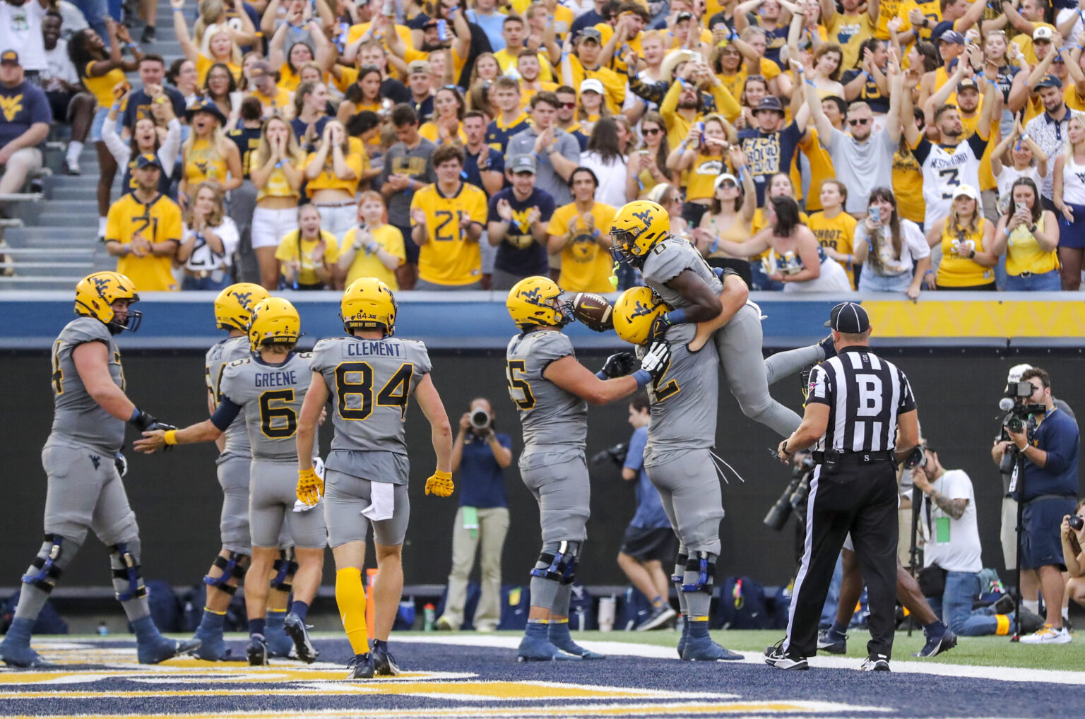 Clement catches on, sparks West Virginia in 56-17 win against Duquesne ...