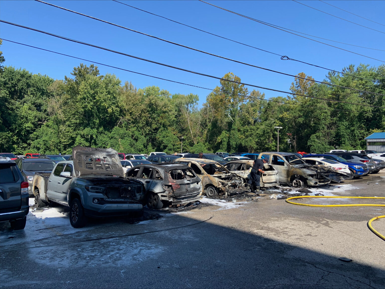 Fallen power line sparks blaze that destroys 14 vehicles in CAMC ...